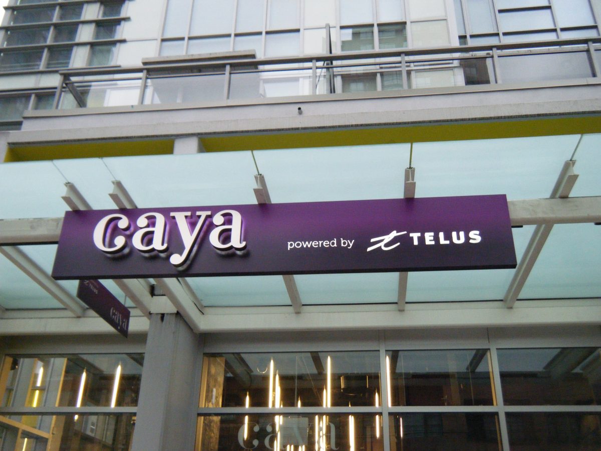 Caya Storefront Signage - UFOs Made Here